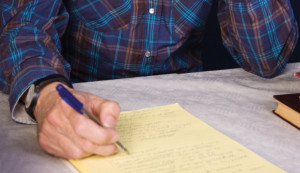 Researcher taking notes - PlaceMakers